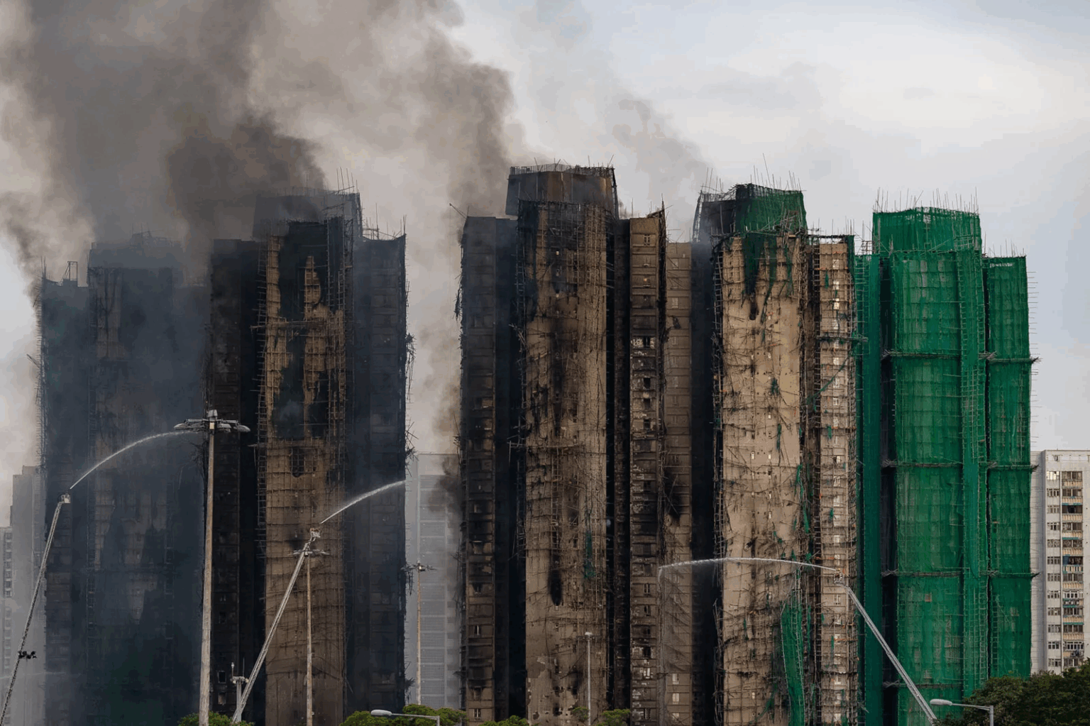 Death toll in Hong Kong high-rise fire rises to 128, with dozens still ...